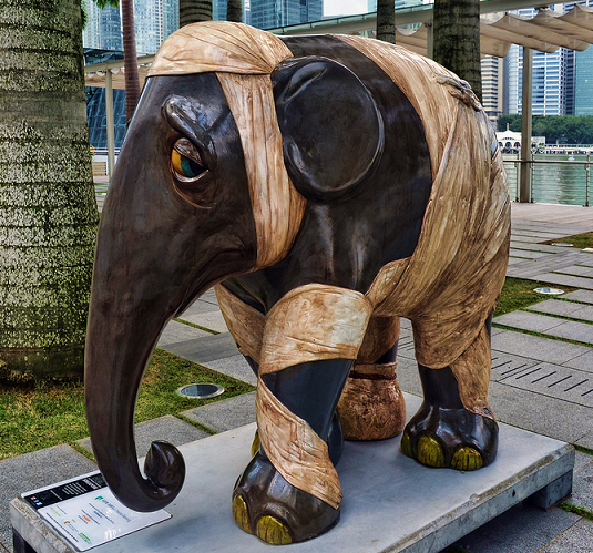 The elephants march into town, hurrah! Statues stomp into Manchester ...