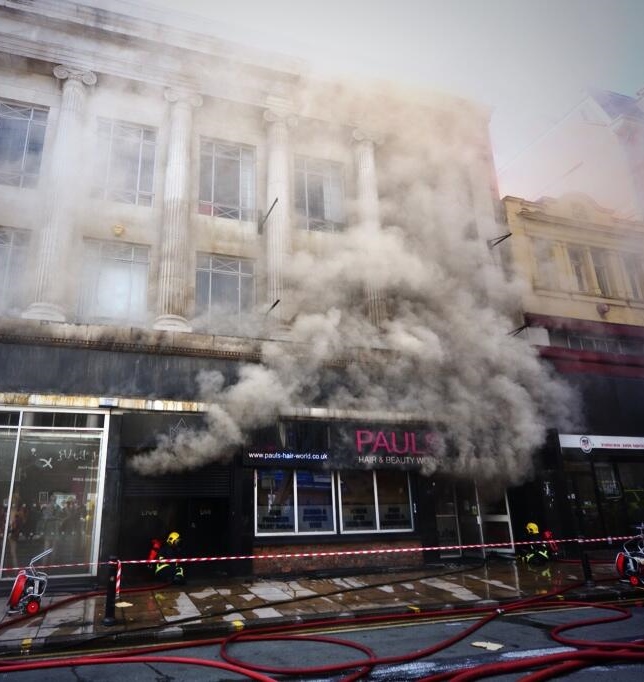 More than 60 fire fighters battle huge Oldham Street blaze in heart of ...