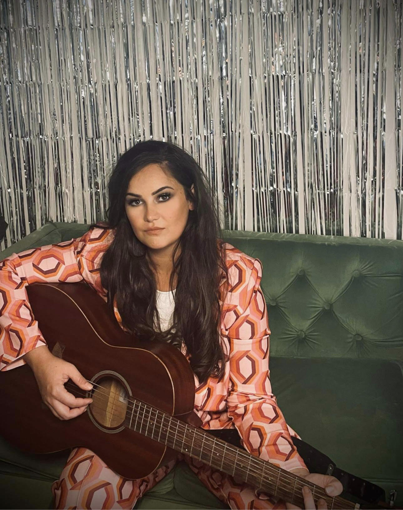 Singer who quit corporate jobs celebrating number one hit - Mancunian ...