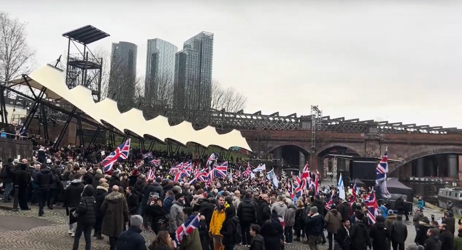 Watch: Thousands march in Manchester against soaring rates of ...