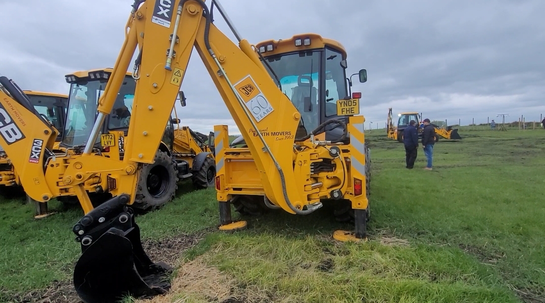 WATCH: Getting diggy with it! Meet the dancing JCB diggers performing in Oldham - Mancunian Matters