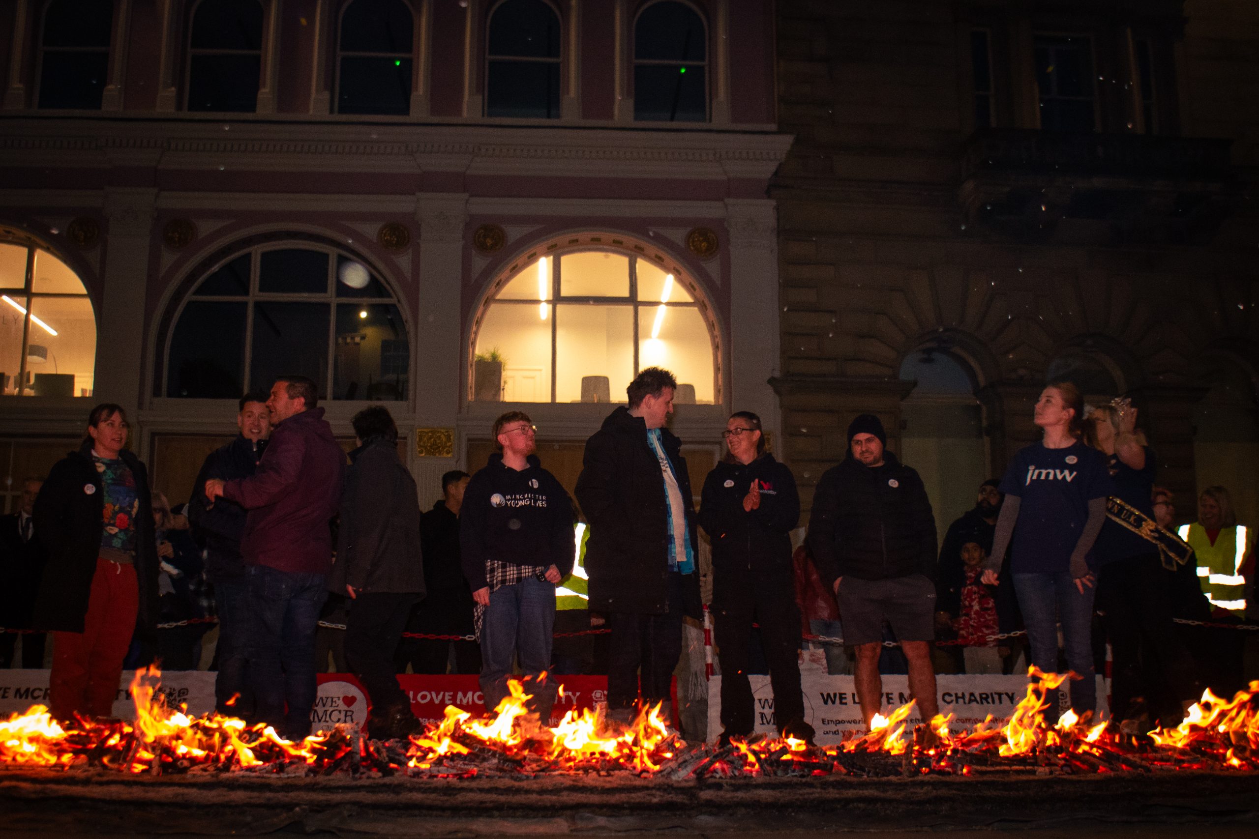 WATCH: Brave firewalkers raise thousands for charity - Mancunian Matters